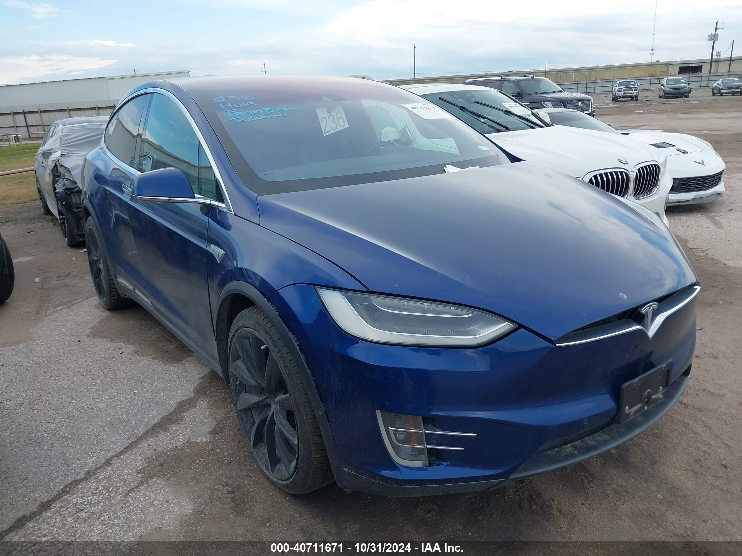 Цена и история 2016 Tesla Model X vin: 5YJXCBE48GF011076 | AutoHelperBot
