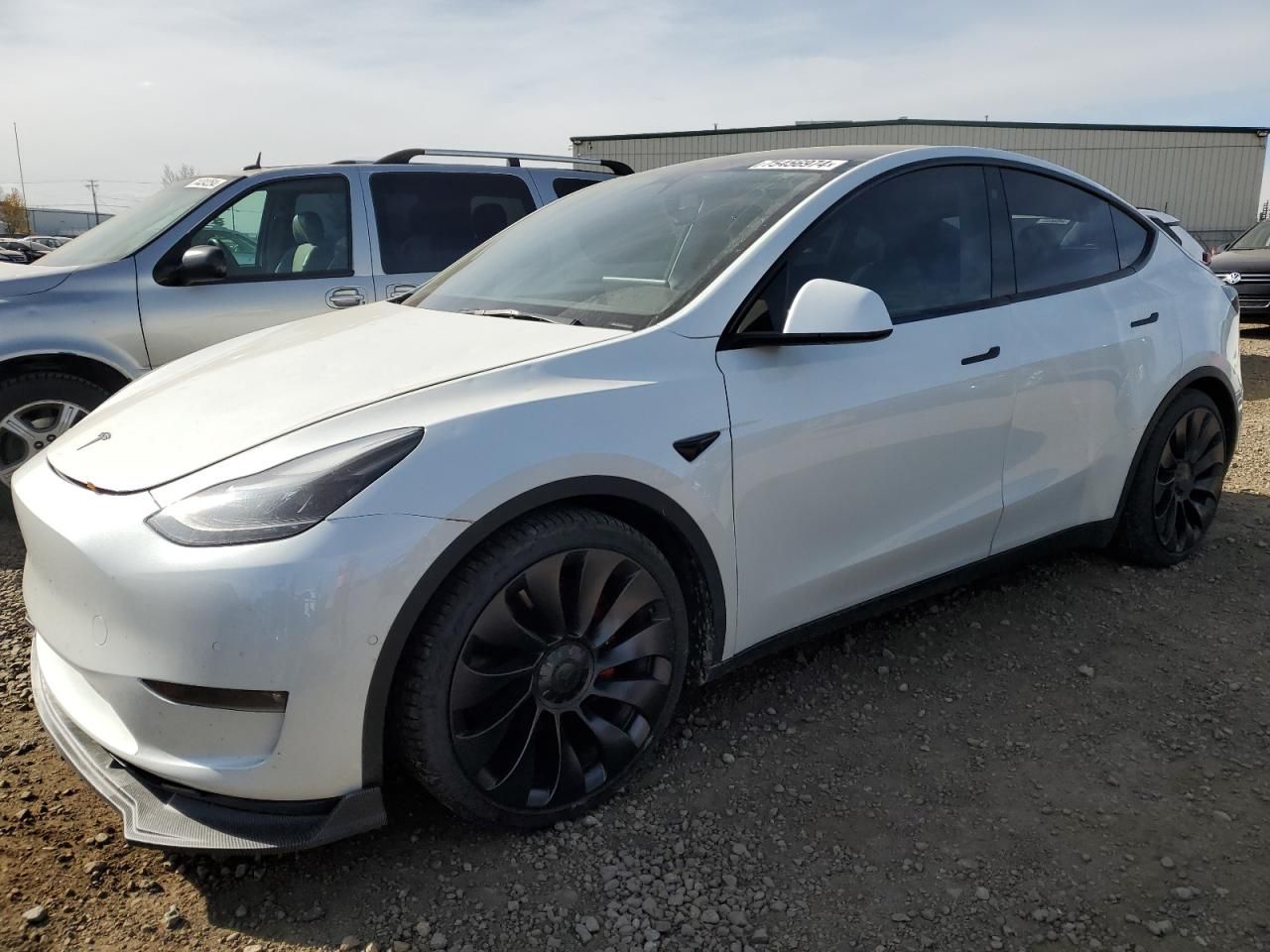 Price & History 2021 Tesla Model Y vin: 5YJYGDEF0MF157733 | AutoHelperBot